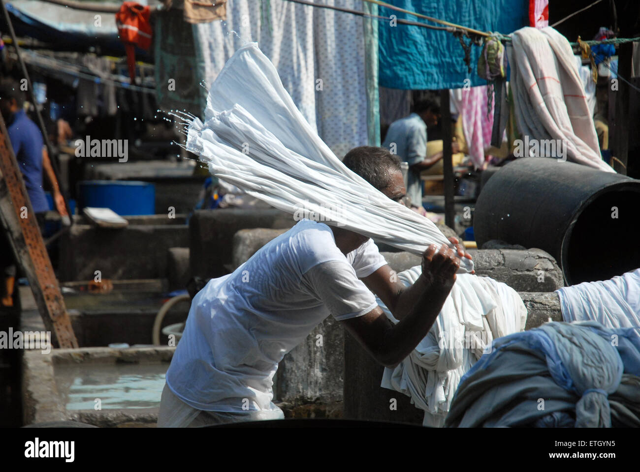 Men washing clothes at Mahalaxmi Dhobi Ghat open air laundromat, Mumbai ...