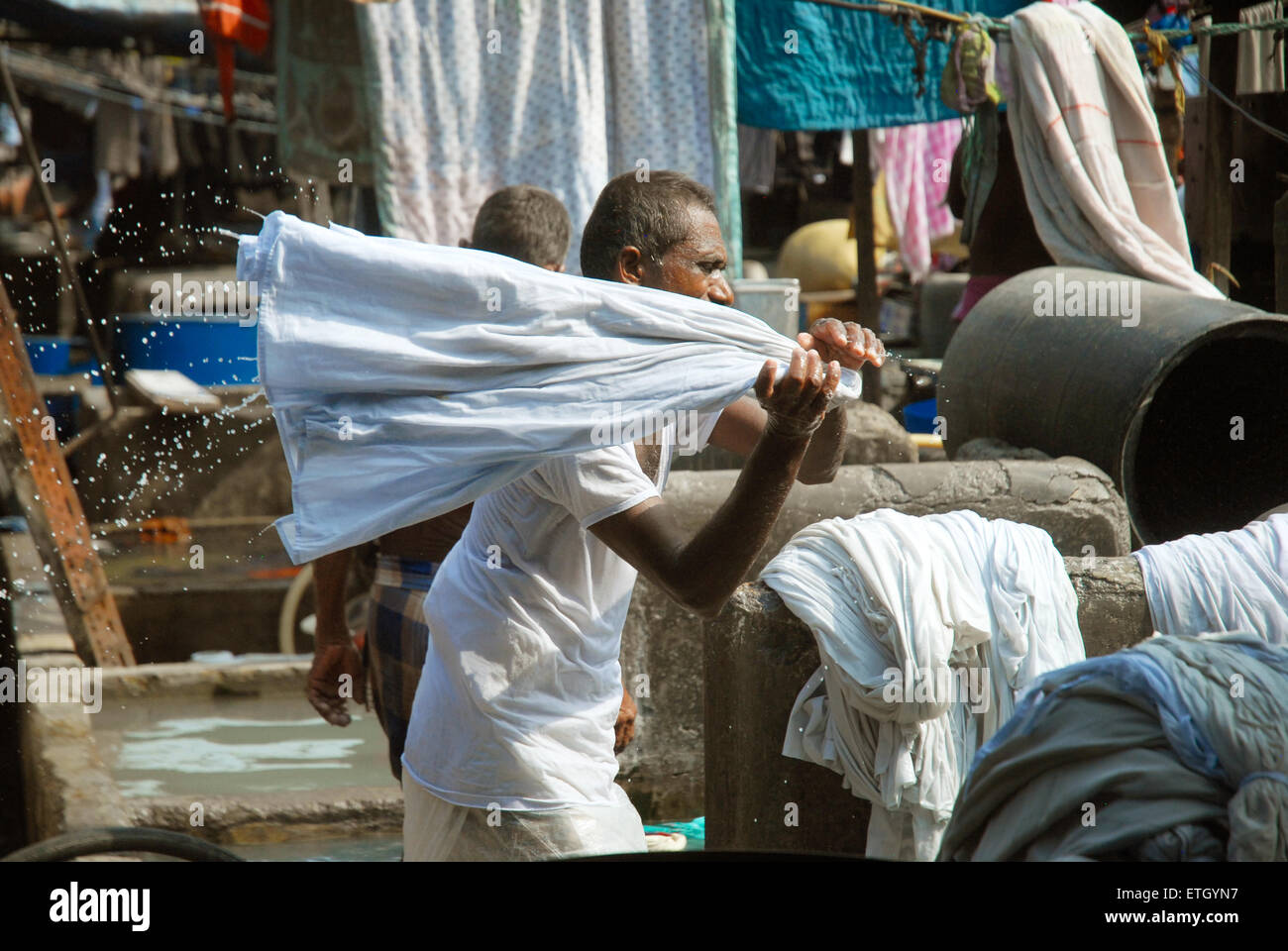 Men washing clothes at Mahalaxmi Dhobi Ghat open air laundromat, Mumbai ...