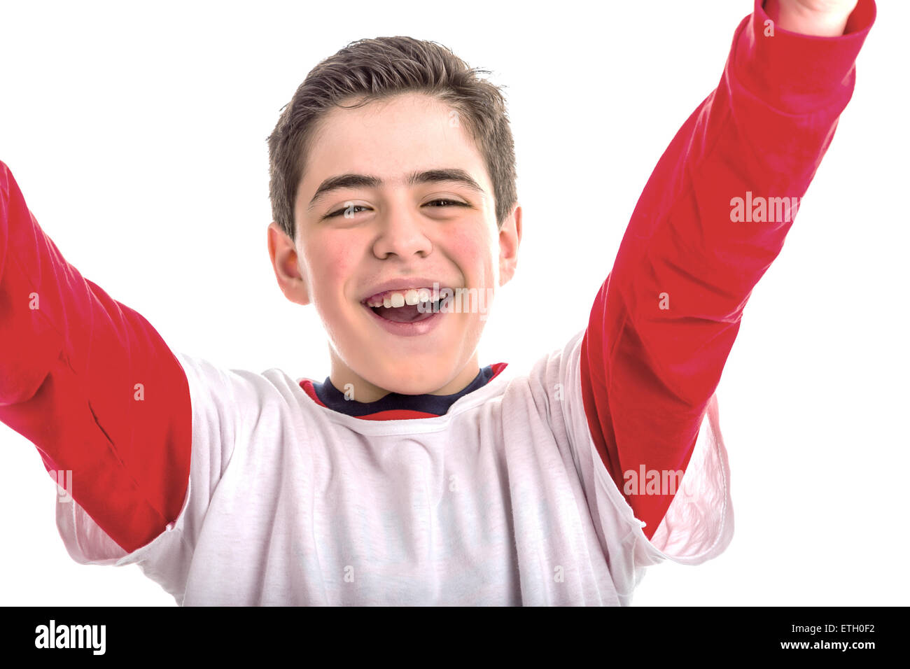 A cute Caucasian boy offers a hug outstretching arms to viewer. He ...