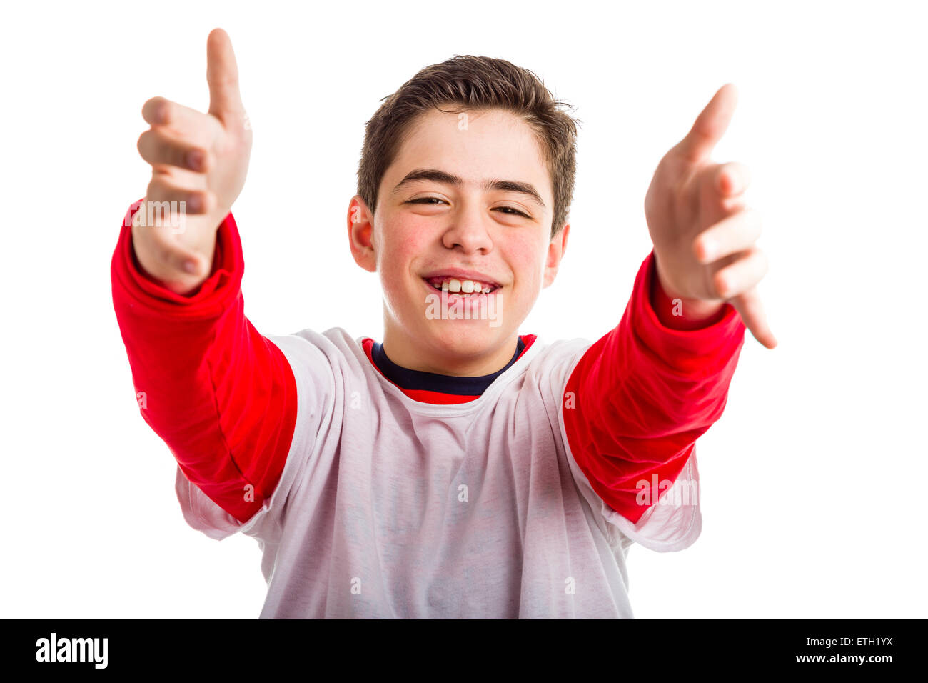 A cute Caucasian boy offers a hug outstretching arms to viewer. He ...
