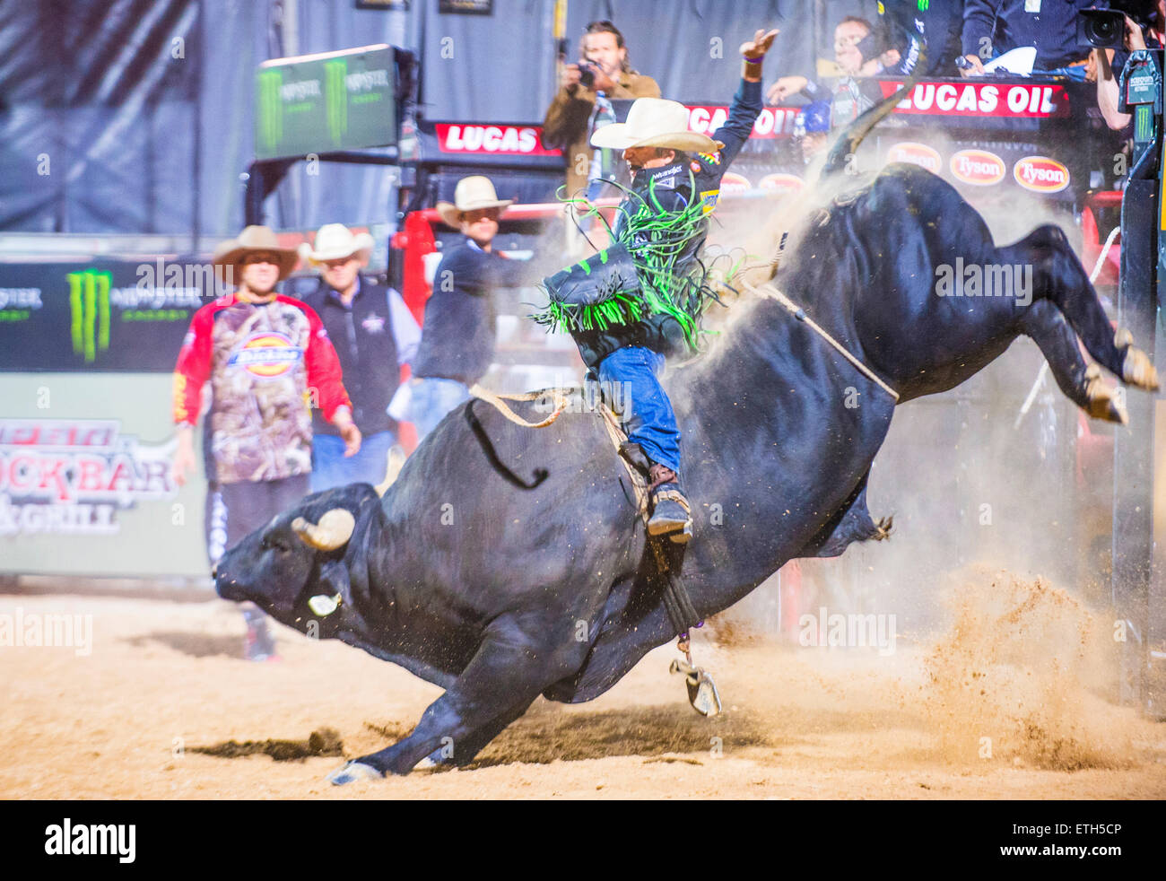 Cowboy Participating in a Bull riding Competition at the Las Cowboy ...