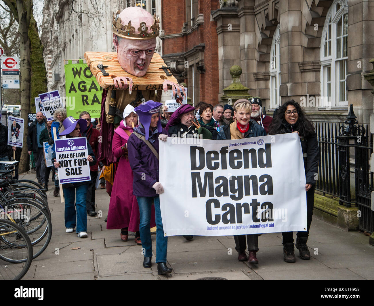 Civil rights campaigners with a giant puppet of the Lord Chancellor and ...