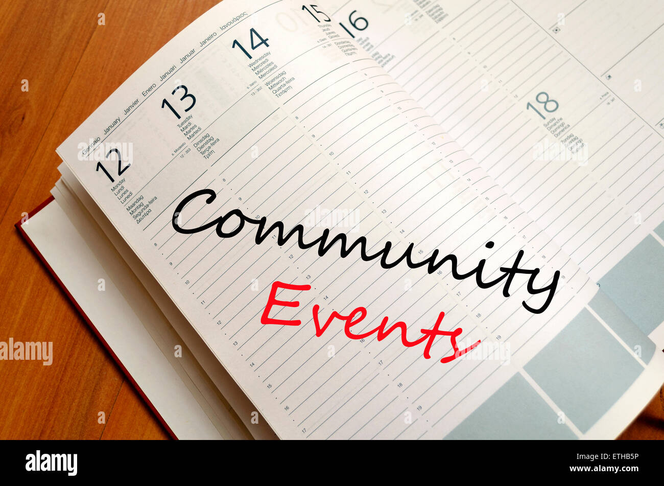 Business Notepad on wooden table Community events concept Stock Photo ...