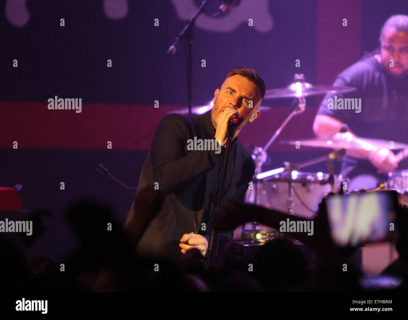 Gary Barlow, Mark Owen and Howard Donald of Take That perform at the O2 ...