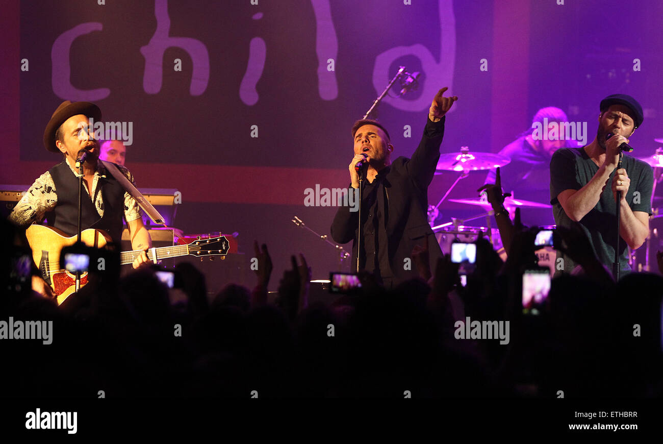 Gary Barlow, Mark Owen and Howard Donald of Take That perform at the O2 ...