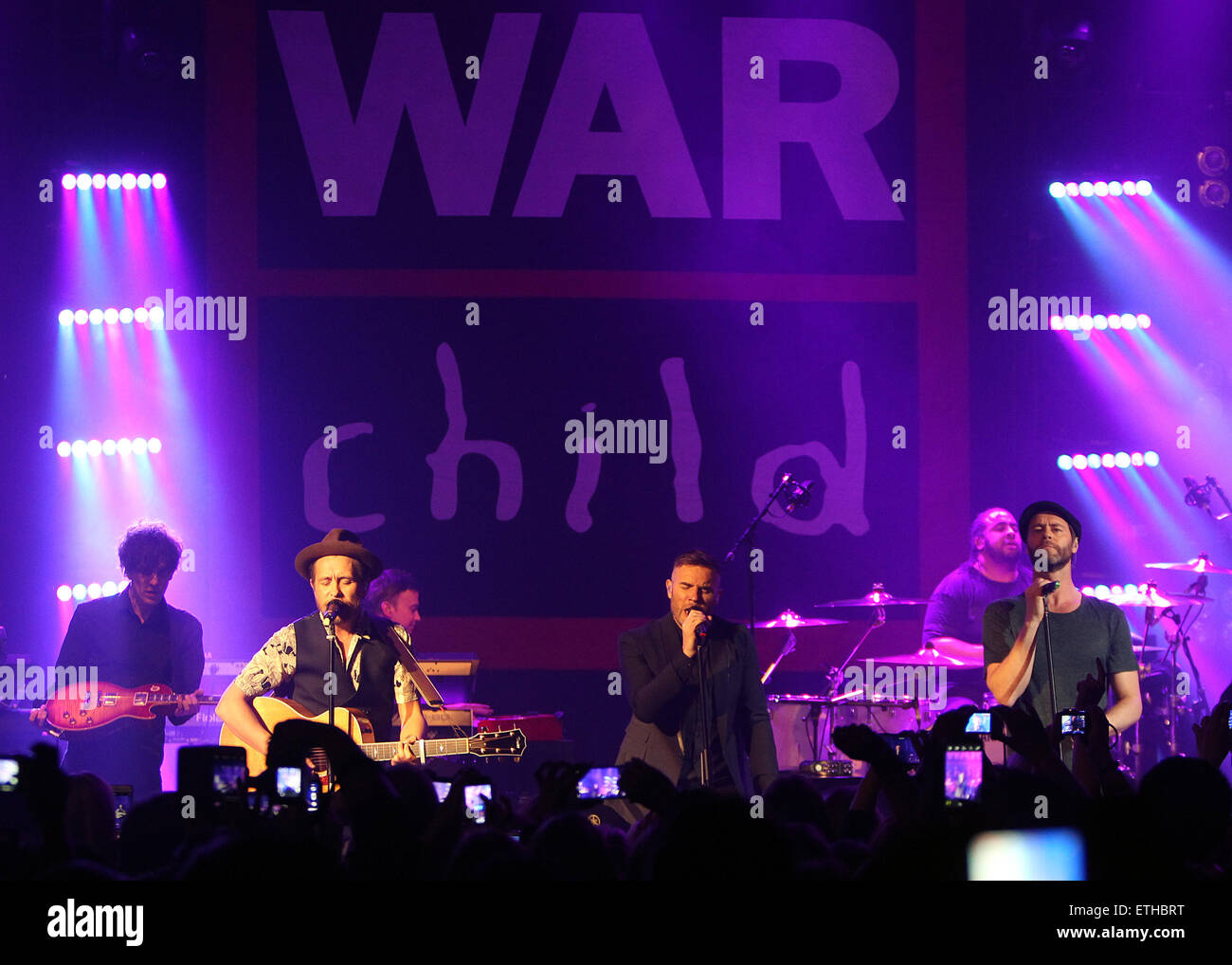 Gary Barlow, Mark Owen and Howard Donald of Take That perform at the O2 ...