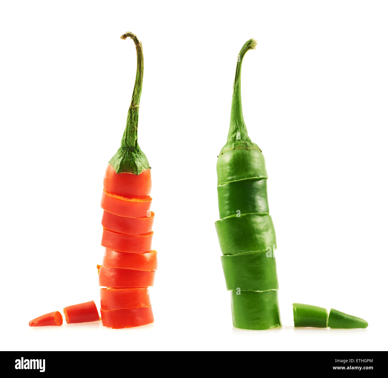 Sliced in pieces chili pepper isolated Stock Photo - Alamy