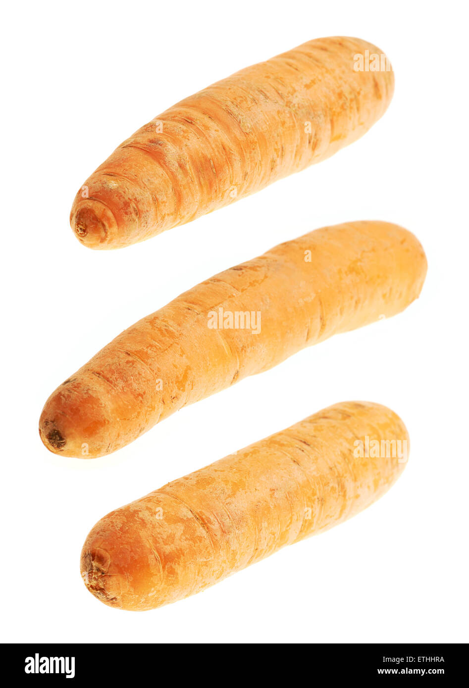 Unpeeled carrot isolated Stock Photo - Alamy