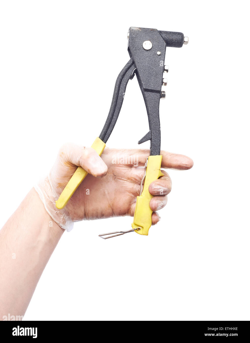 Worker's caucasian male hand holding tool Stock Photo - Alamy