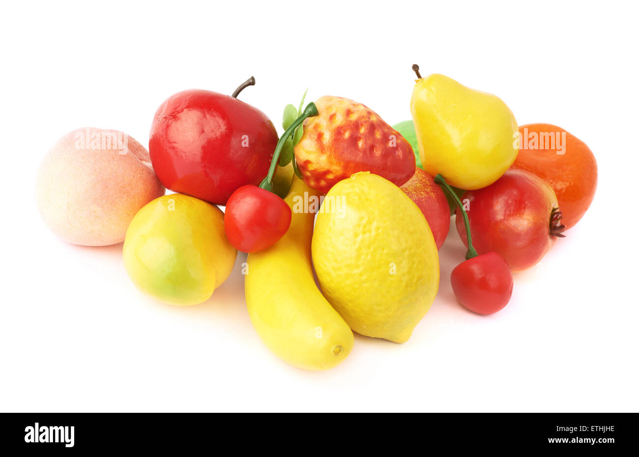 Pile of multiple artificial plastic fruits and berries Stock Photo - Alamy
