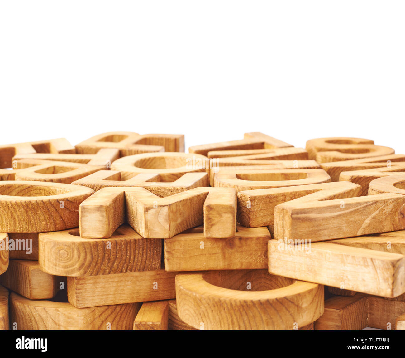 Surface covered with multiple wooden letters Stock Photo - Alamy
