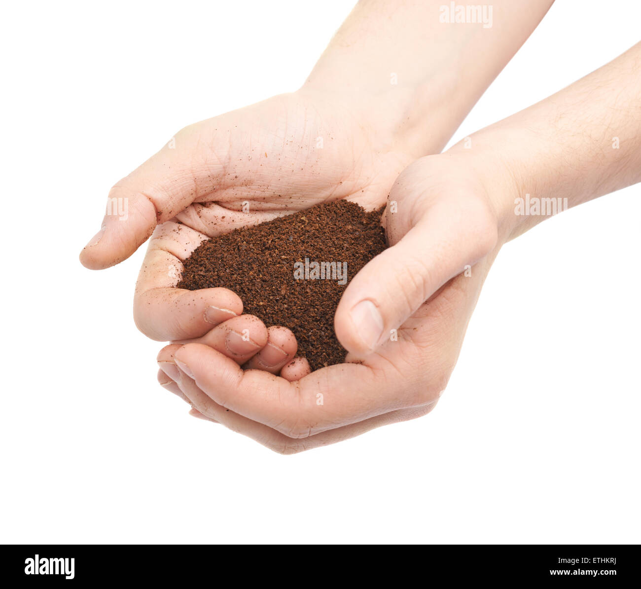Two hands holding a handful of ground soil Stock Photo - Alamy