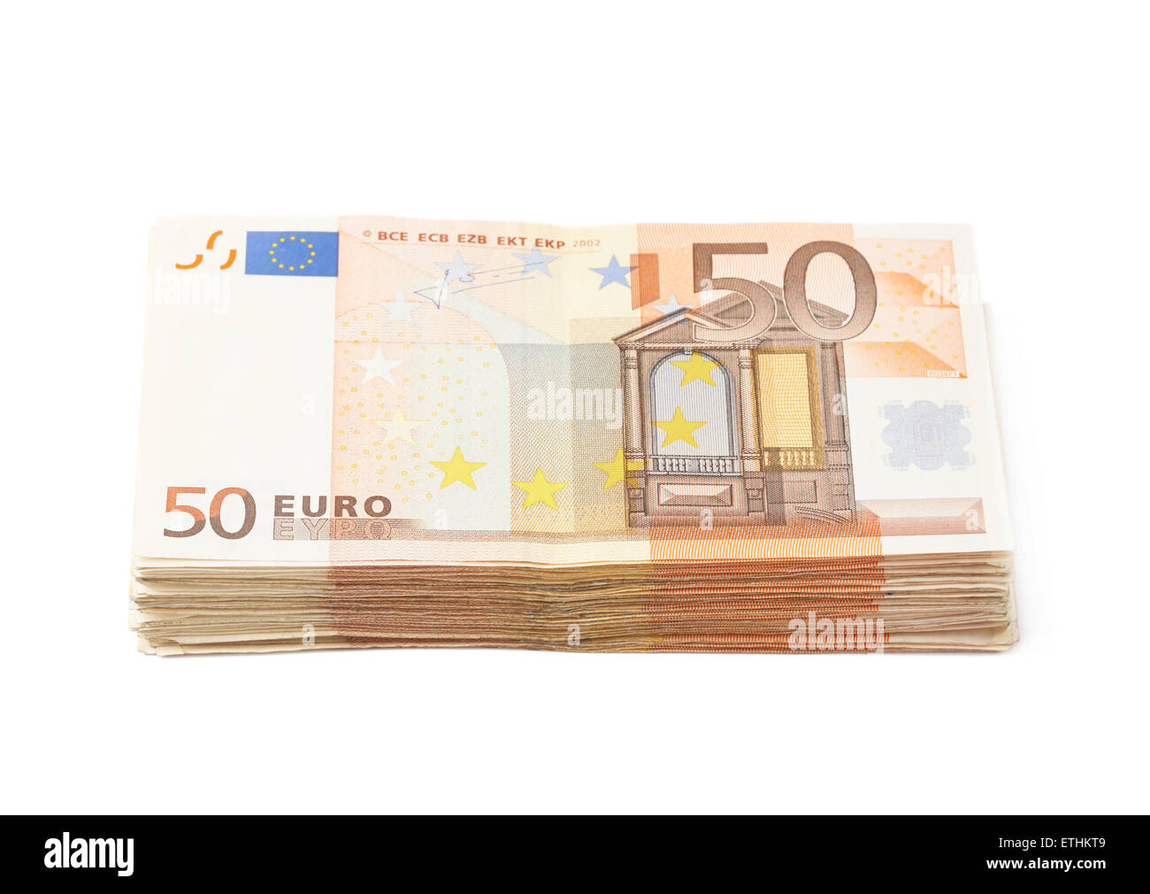 Stack pile of money Stock Photo - Alamy