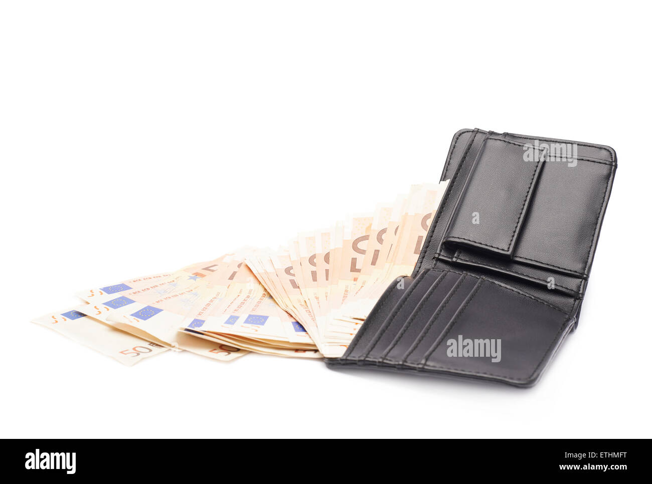 Money falling out of wallet hi-res stock photography and images - Alamy