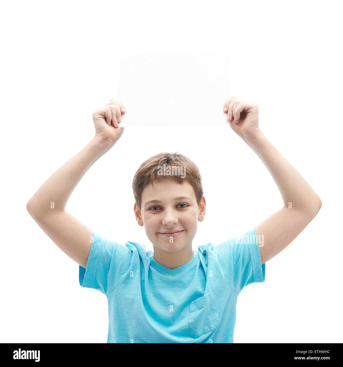 Young boy with a sheet of paper Stock Photo - Alamy