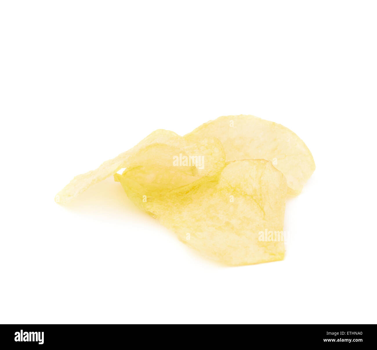 Yellow potato chips isolated Stock Photo - Alamy