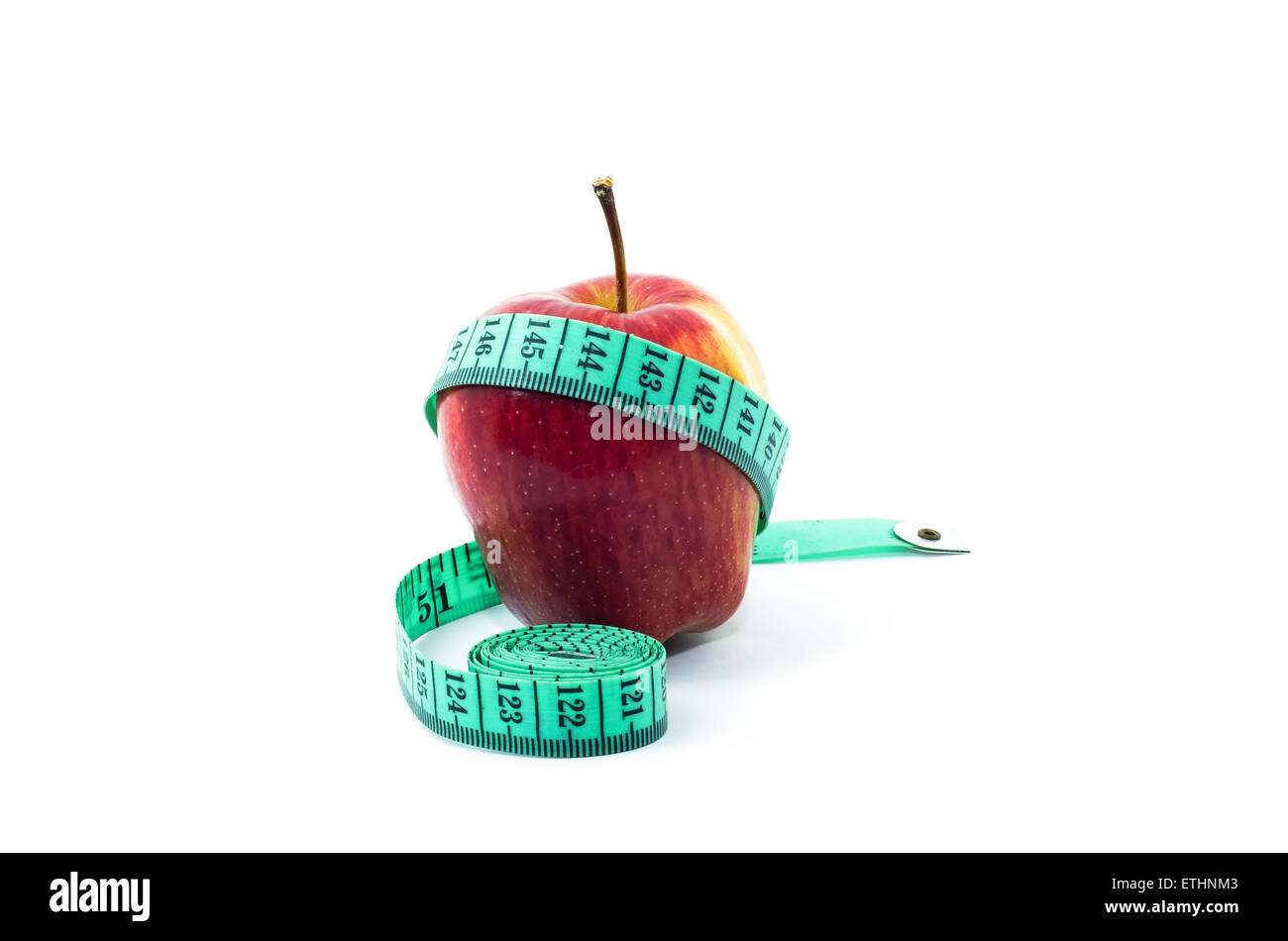 white Background with apple and tape measure Stock Photo - Alamy