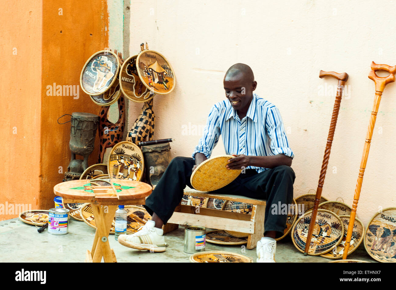 Craftsman at work, handicraft market, "Central Ville", CBD, Kigali ...