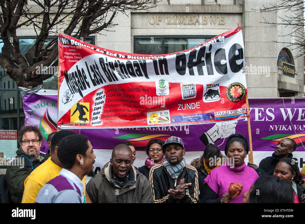 Activists protest outside the Zimbabwean Embassy in London against ...