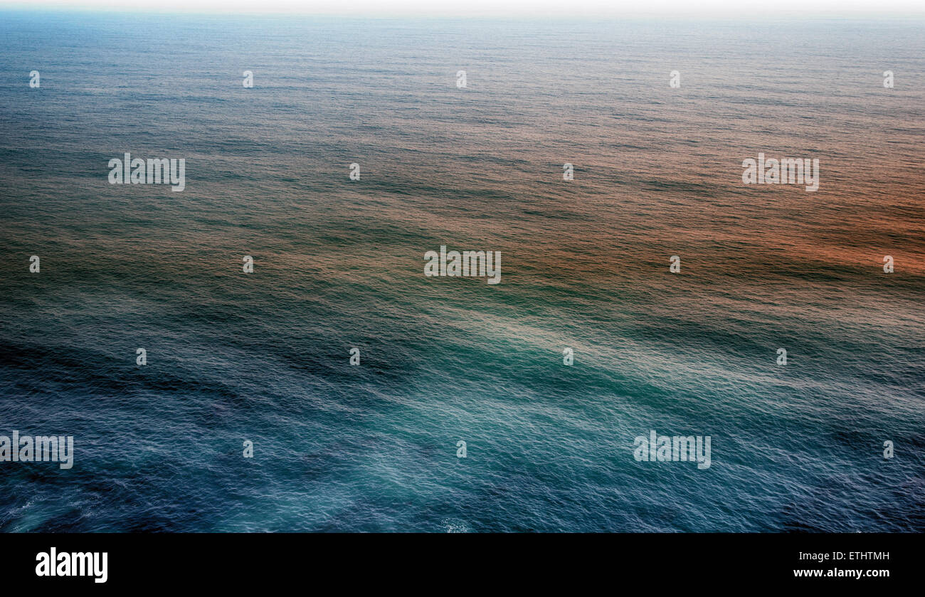 Sea wave with sun flare - vintage filter Stock Photo - Alamy