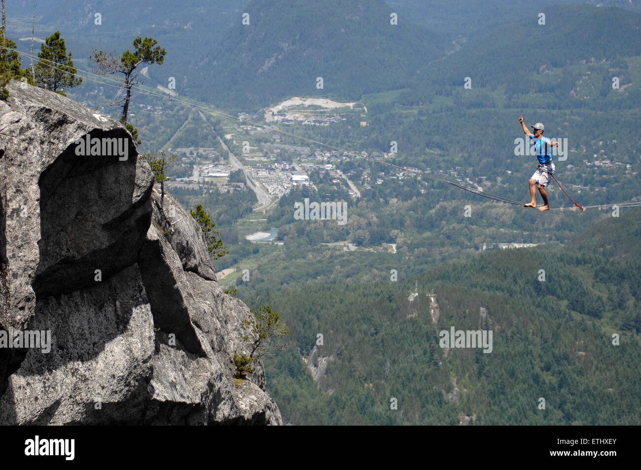 Squamish, Canada. 13th June, 2015. An adventure athlete walks the ...