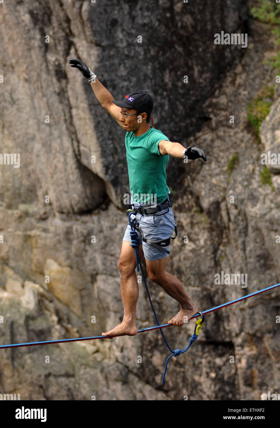 Squamish, Canada. 13th June, 2015. An adventure athlete walks the ...