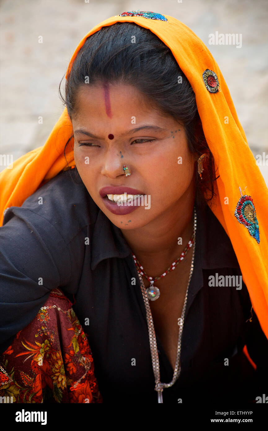 Portrait of a Rajasthani woman in distinctive Rajasthani dress ...