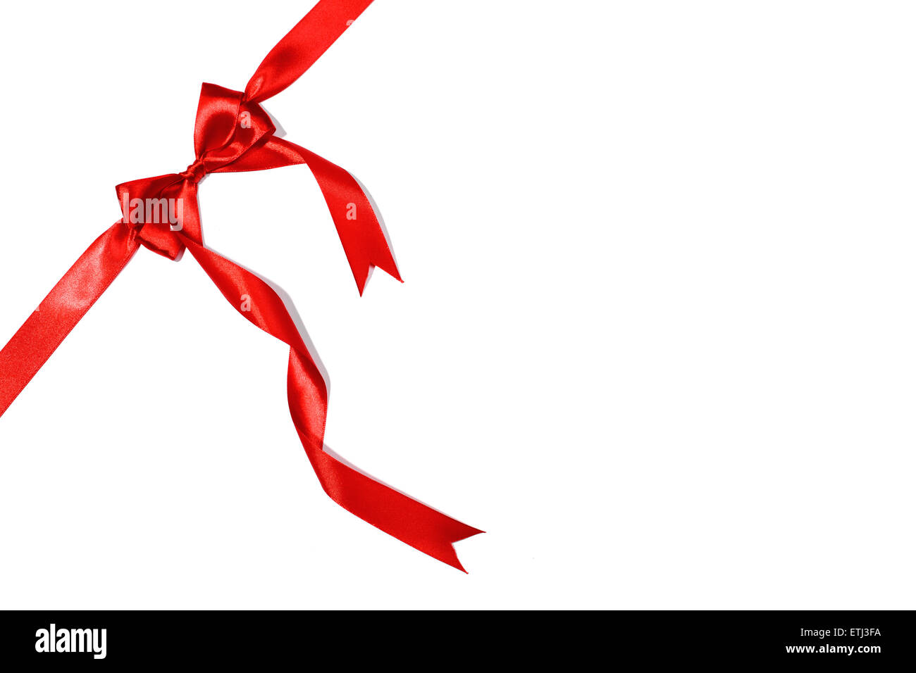 Red ribbons with bow Stock Photo - Alamy