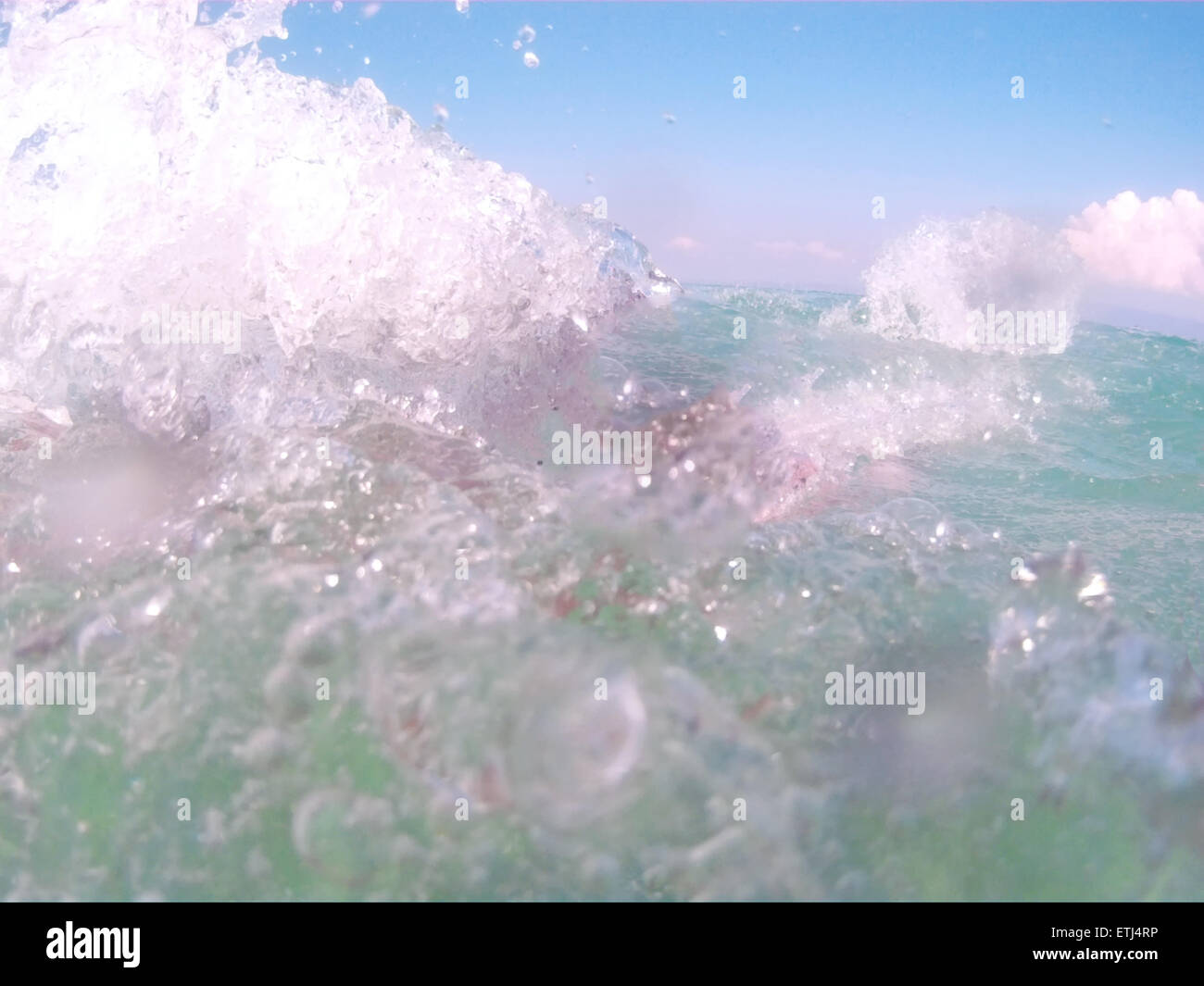 Bubbles sea recorded on exotic coast Stock Photo - Alamy