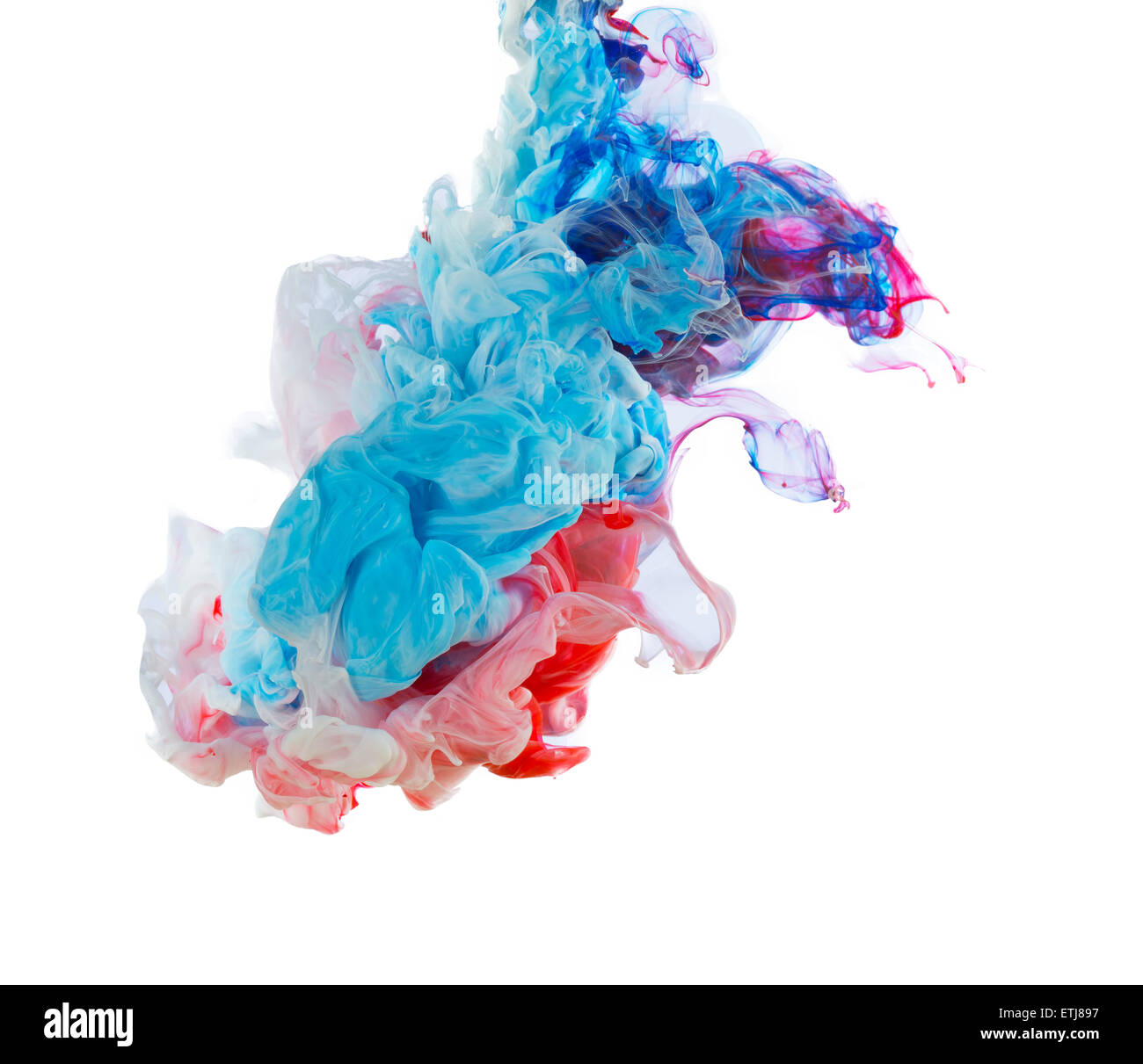 Studio shot of colored ink in water, isolated on white background Stock ...