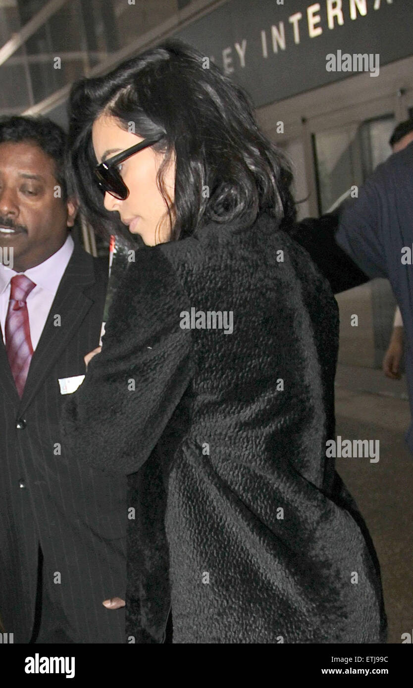 Kim Kardashian West signs autographs for fans upon her arrival at Los ...