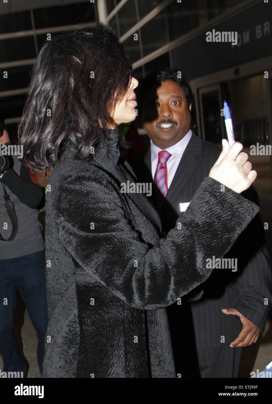 Kim Kardashian West signs autographs for fans upon her arrival at Los ...