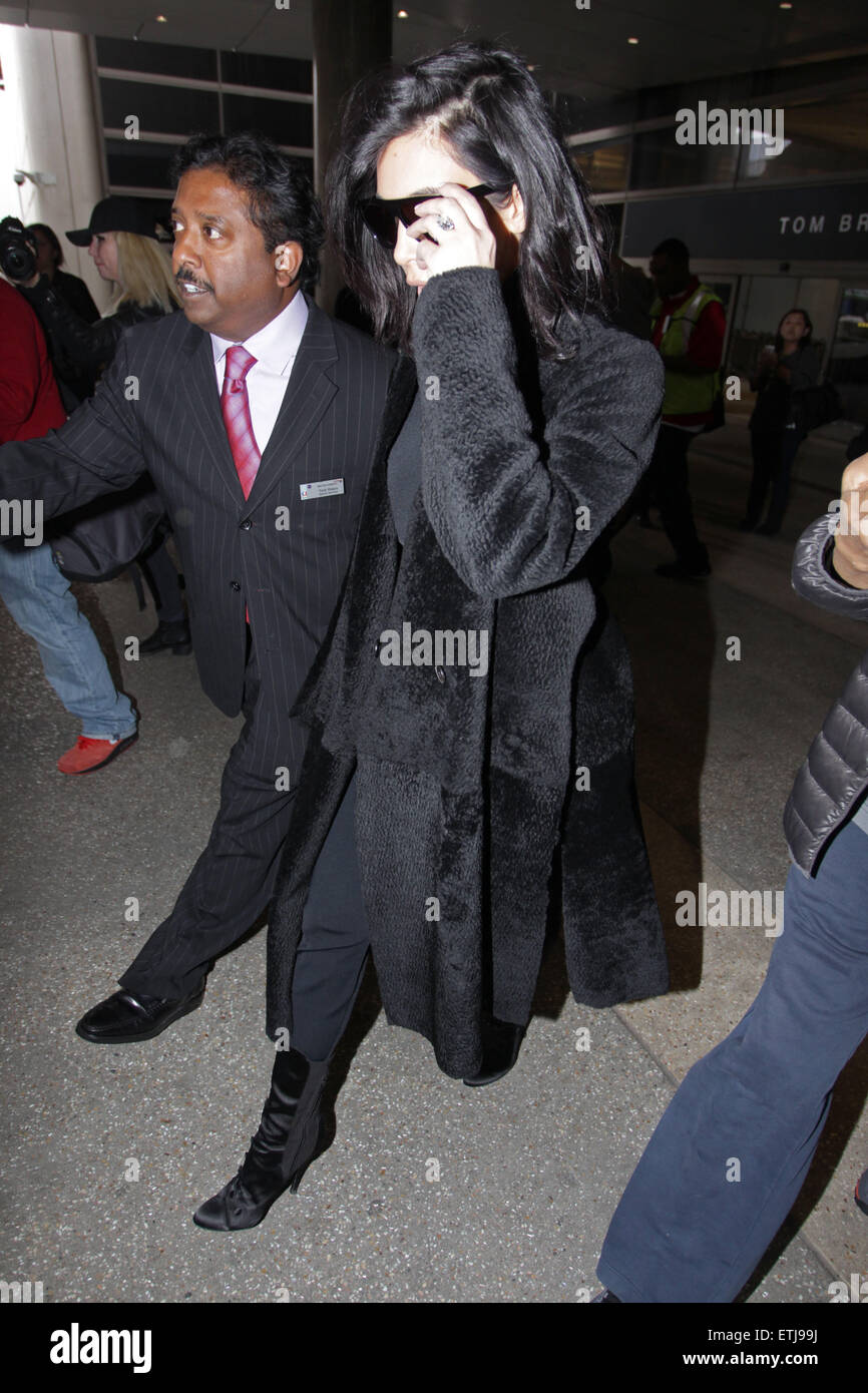 Kim Kardashian West signs autographs for fans upon her arrival at Los ...