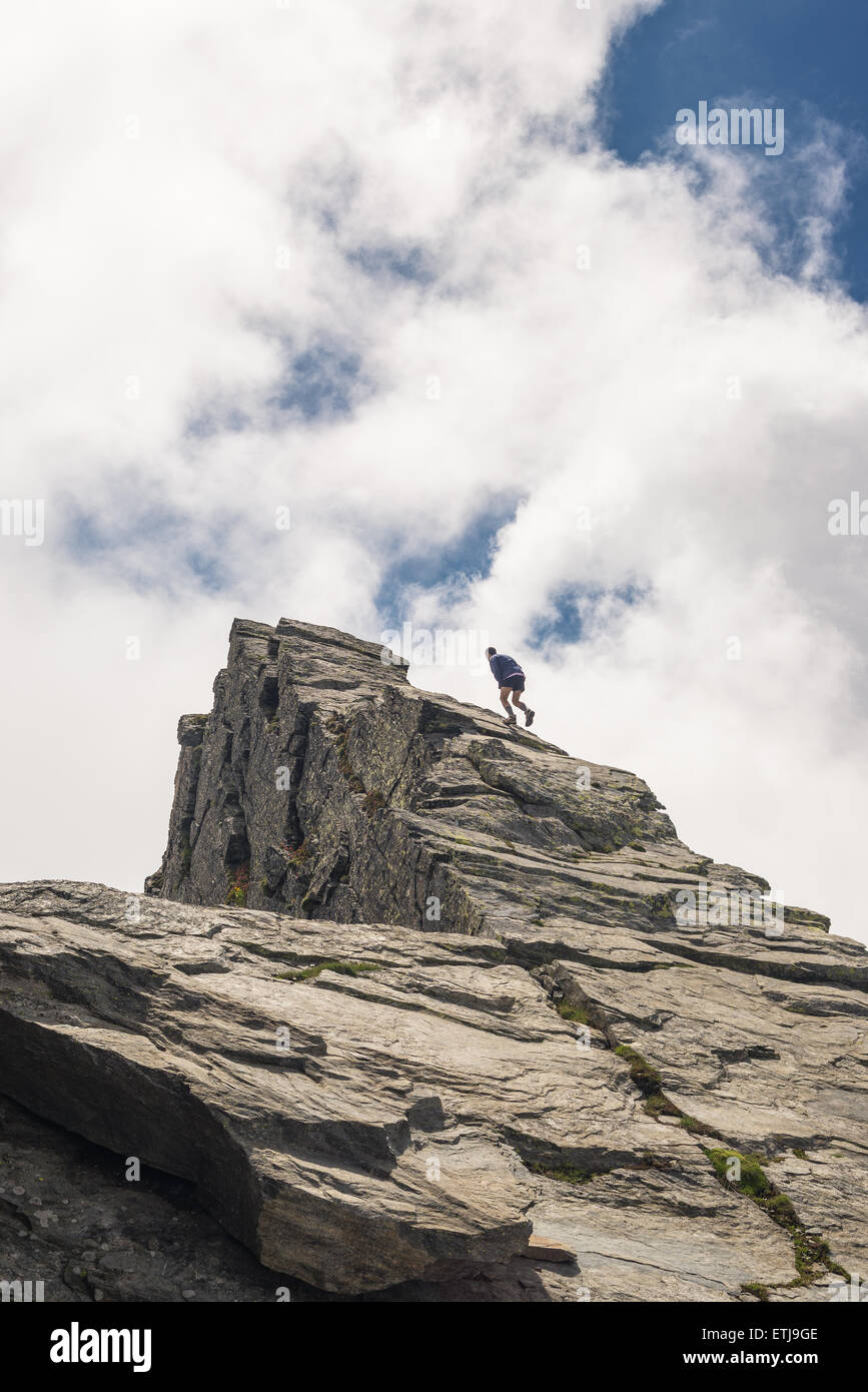 Climbing on steep slope hi-res stock photography and images - Alamy