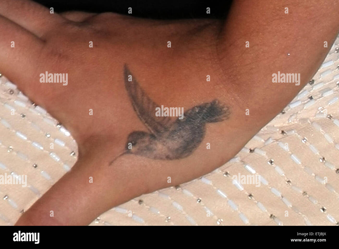 Hummingbird Tattoo Behind Ear