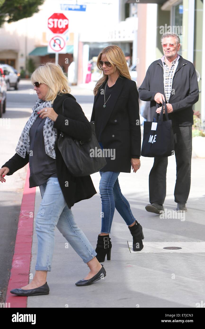 Heidi Klum goes shopping with her parents at Paige in Brentwood ...