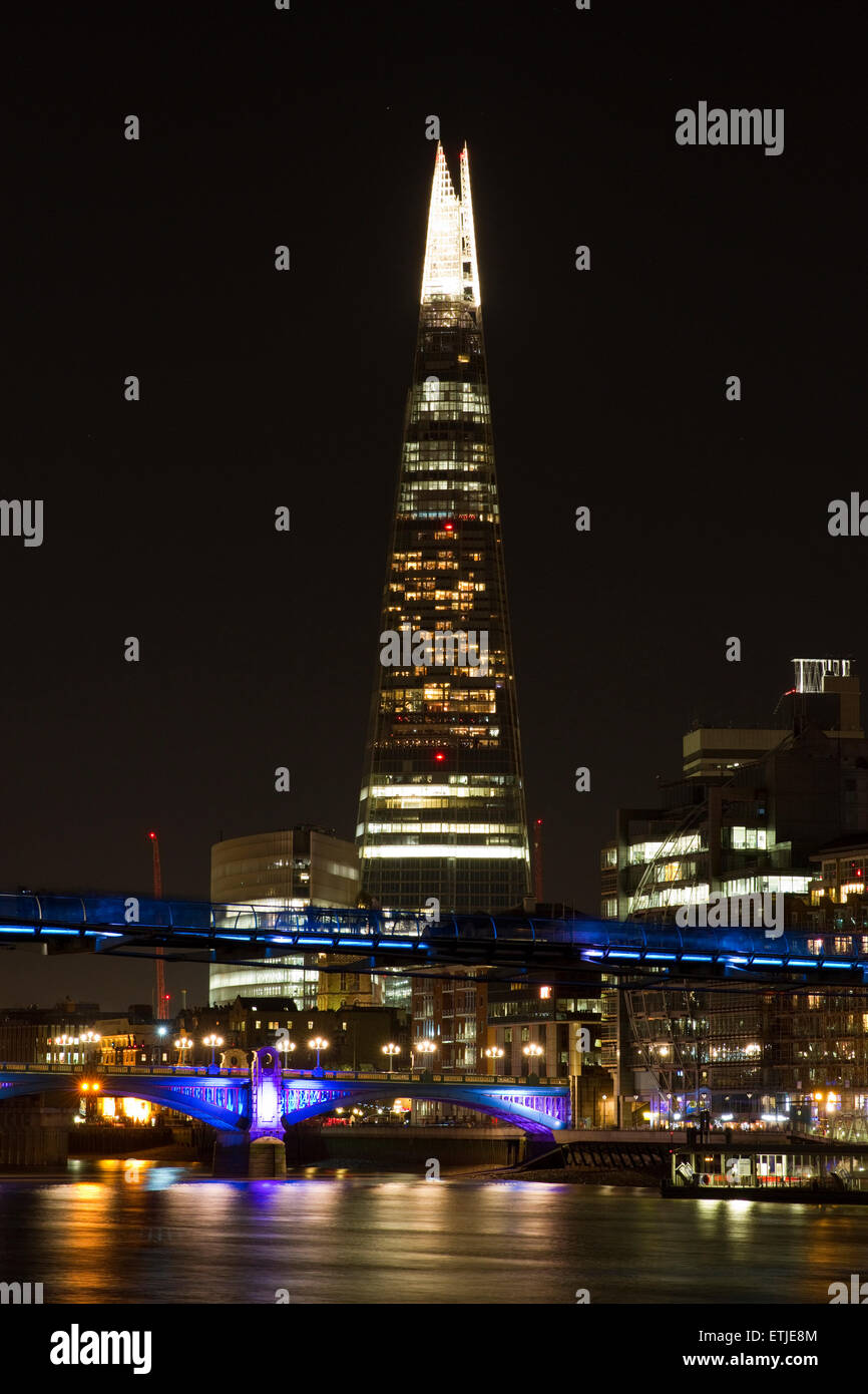 The Shard and Millennium Bridge at night Stock Photo - Alamy