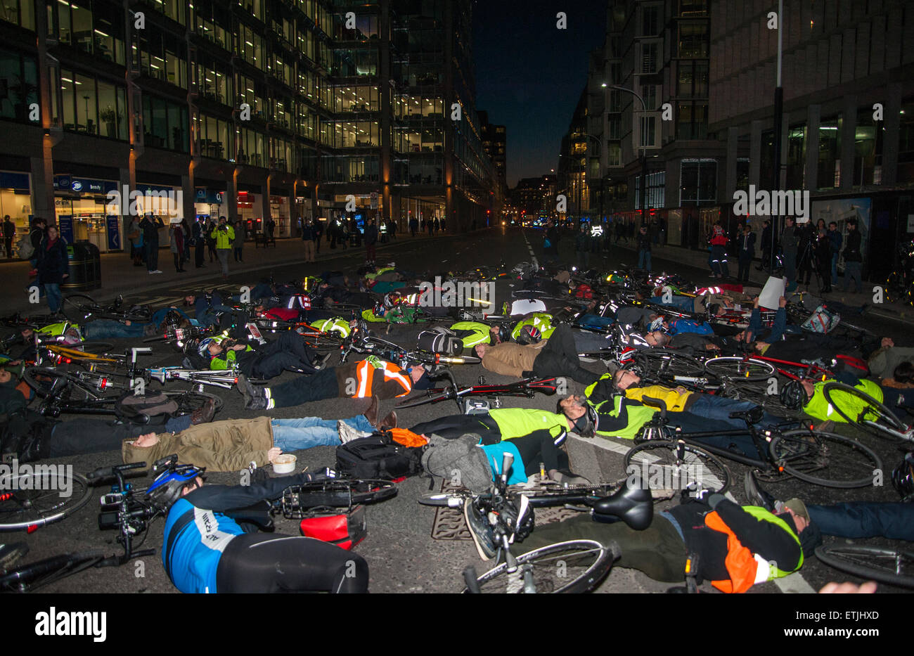 London cyclists hold a die in protest on the road outside Westminster ...