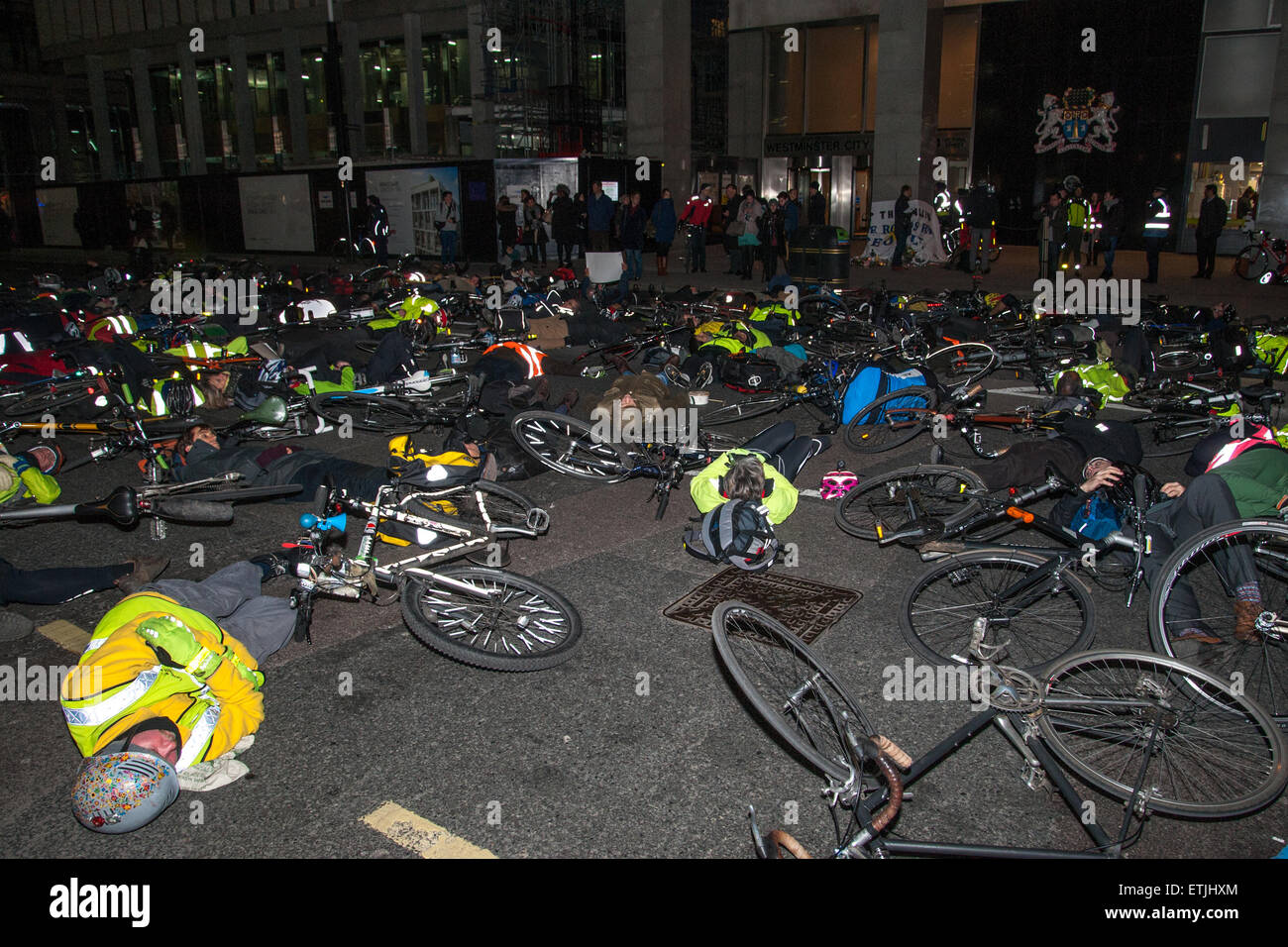 London cyclists hold a die in protest on the road outside Westminster ...