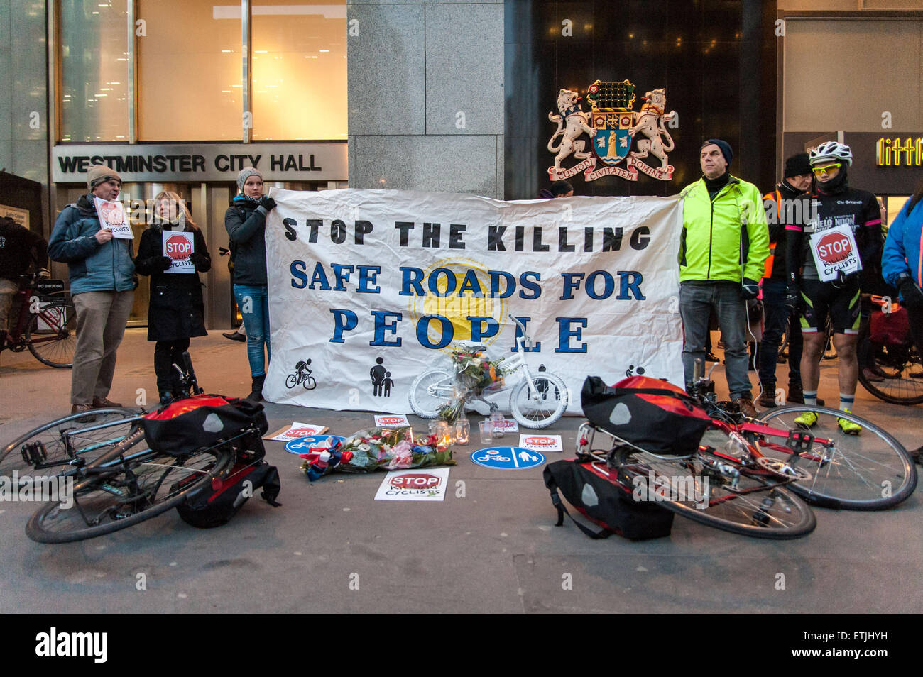 London cyclists hold a die in protest on the road outside Westminster ...