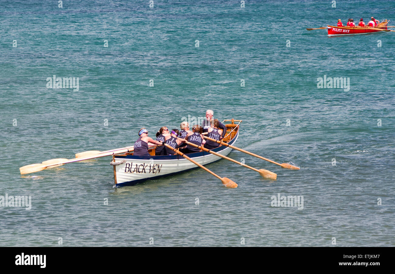 Cornish Pilot Gig Sea Rowling in Swanage Bay Stock Photo - Alamy