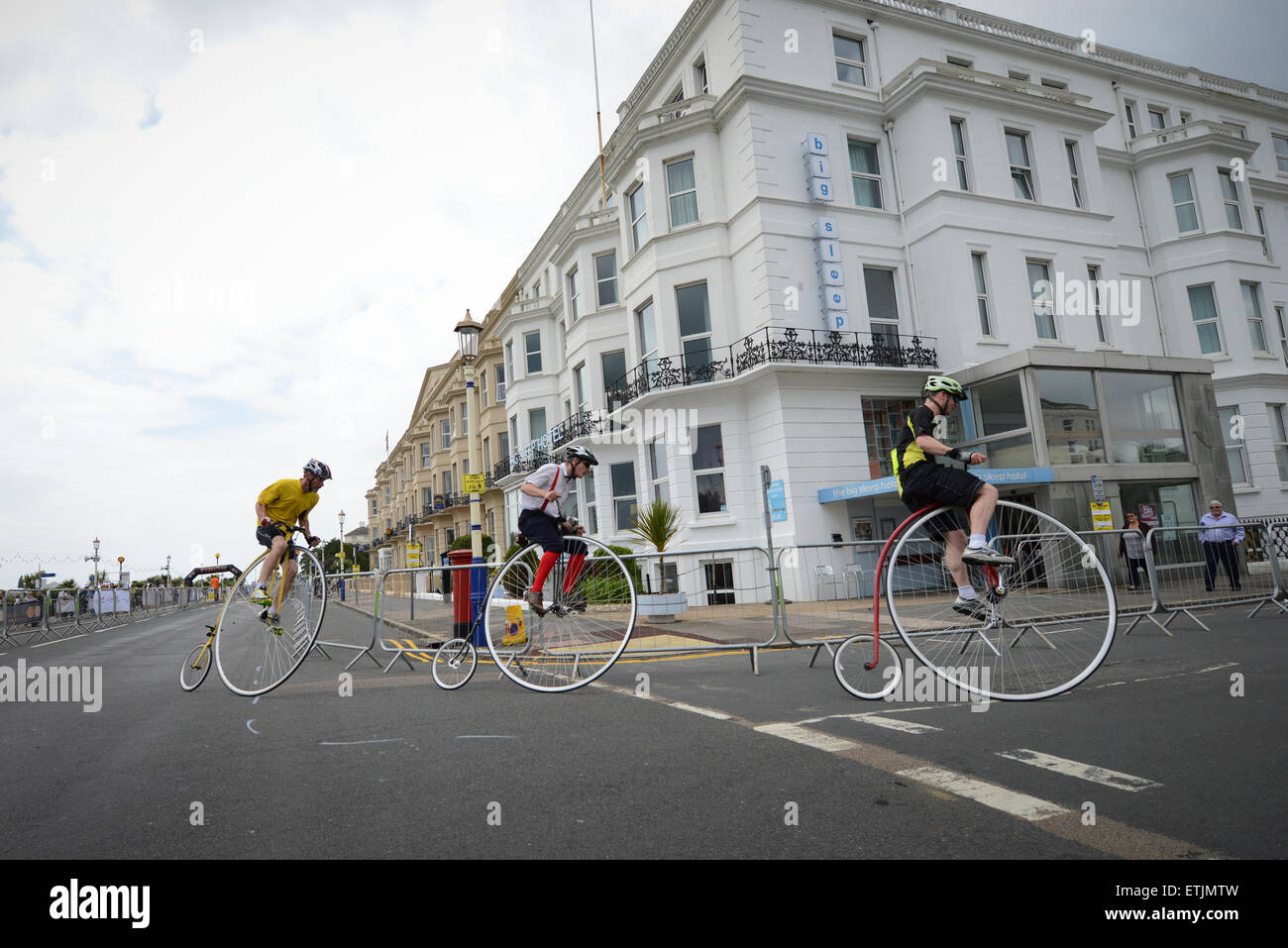 Competitors take part in the Penny Farthing Championship bike race ...
