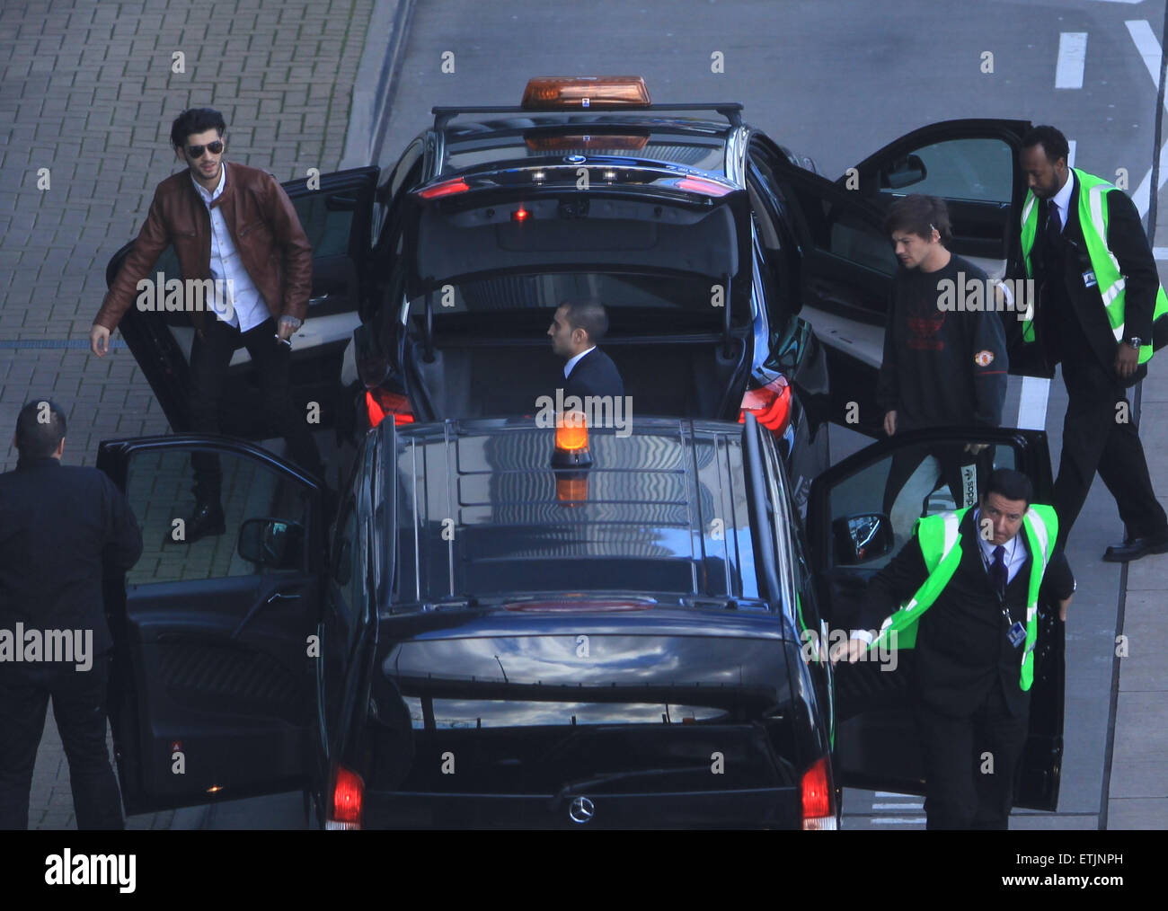 One Direction arrive back in London from their world tour in Tokyo ...