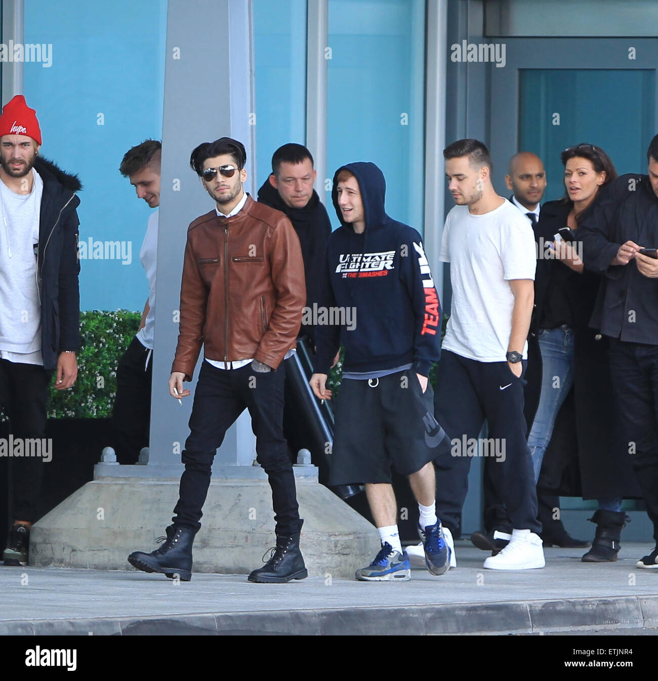 One Direction arrive back in London from the World Tour in Tokyo ...