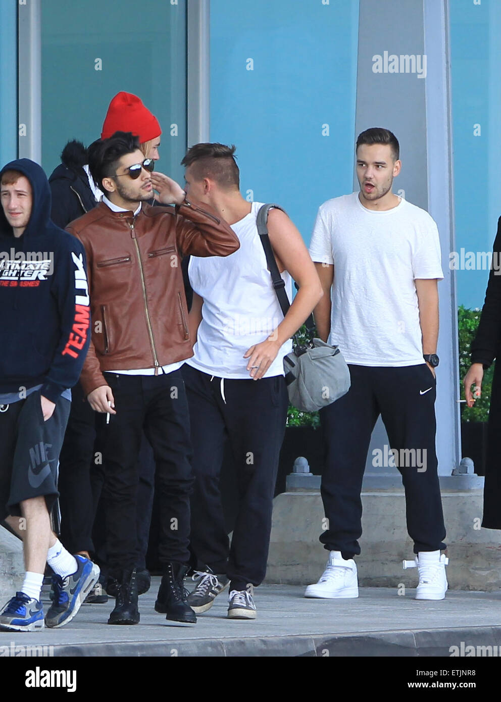 One Direction arrive back in London from the World Tour in Tokyo ...