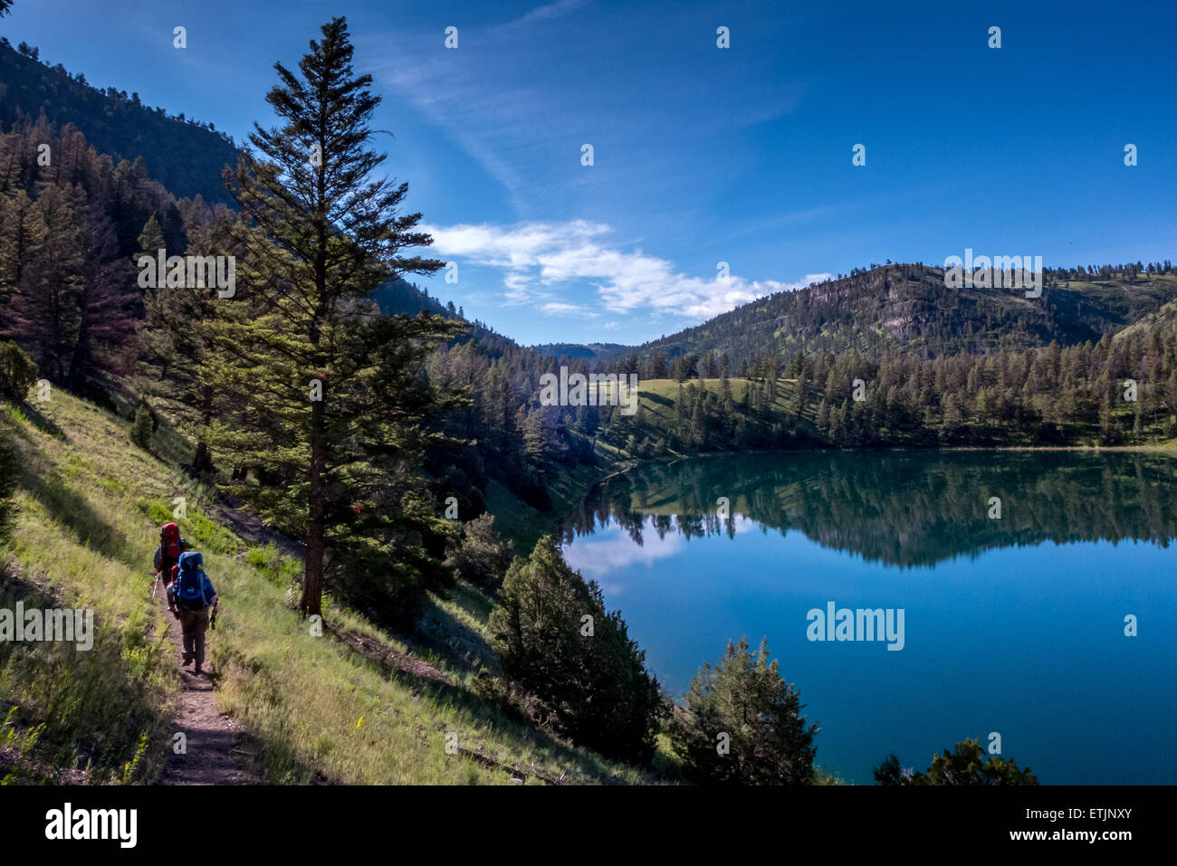 Hidden lake off the beaten track inside the Yellowstone National Park ...