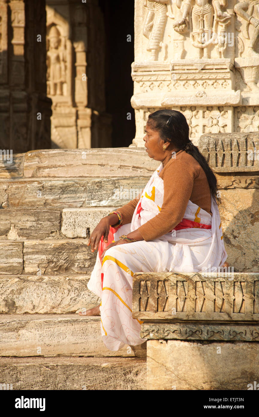Indian woman on temple steps. Jagdish Temple, Udaipur, Rajasthan, India ...