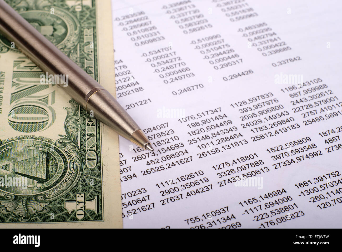 Document with pen and dollars Stock Photo - Alamy