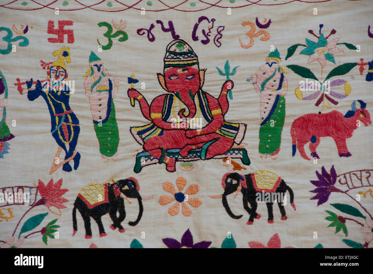 Embroidered textile depicting ganesh and elephants. Rajasthan, India ...