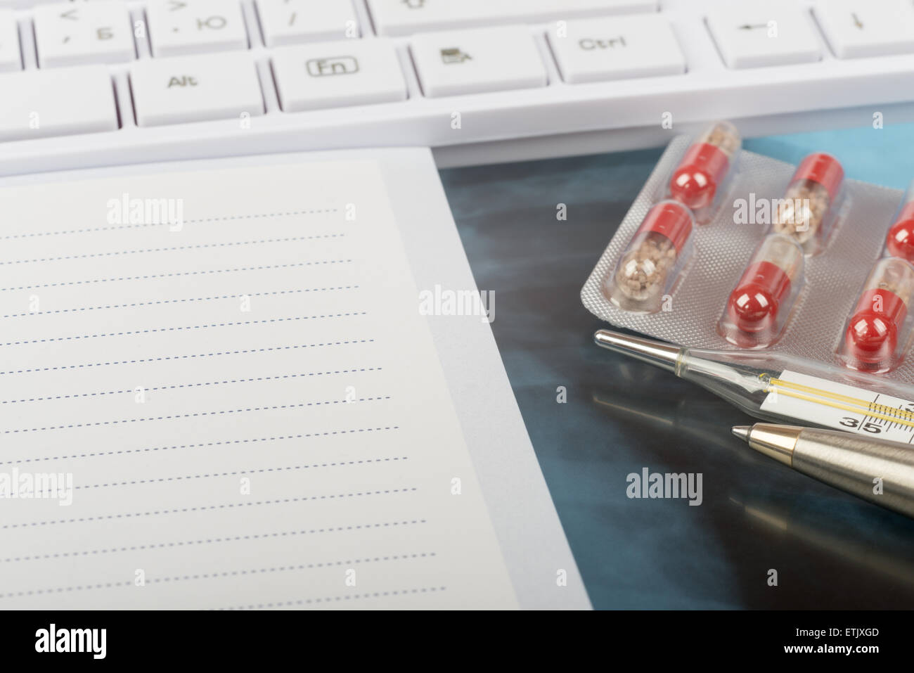 X-ray examination and notebook Stock Photo - Alamy